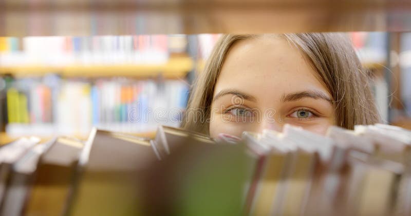 Female Student Searching through Library Books Stock Image - Image of ...