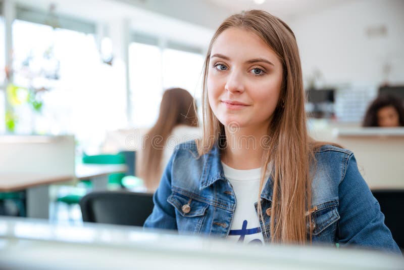 Female Student Sitting at the Table in Classroom Stock Image - Image of ...