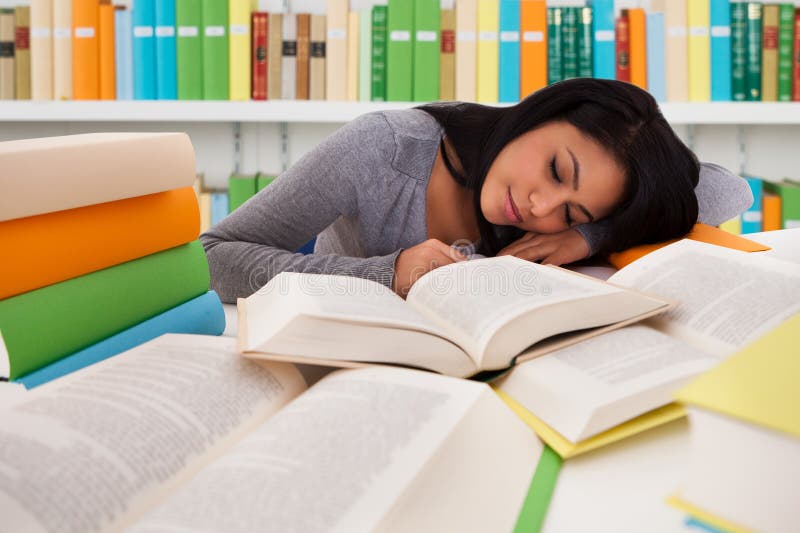 Female Student Sleeping on Books in Library Stock Image - Image of ...