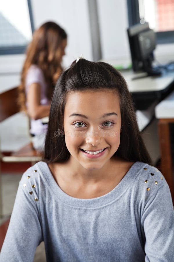 Female Student Smiling in Computer Class Stock Image - Image of ...
