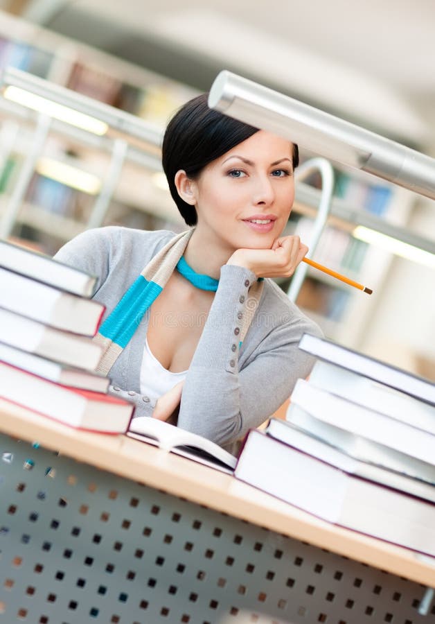 Dreamy Female Student Studies at the Reading Hall Stock Image - Image ...