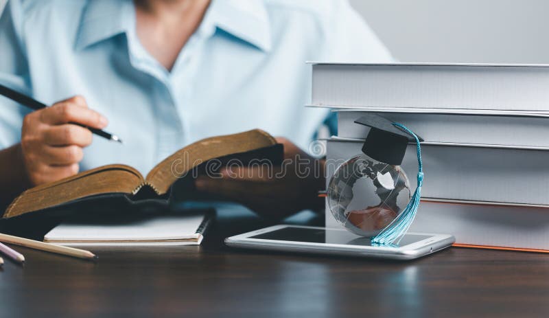 Female Student Study in the School Library. she Using Laptop and ...