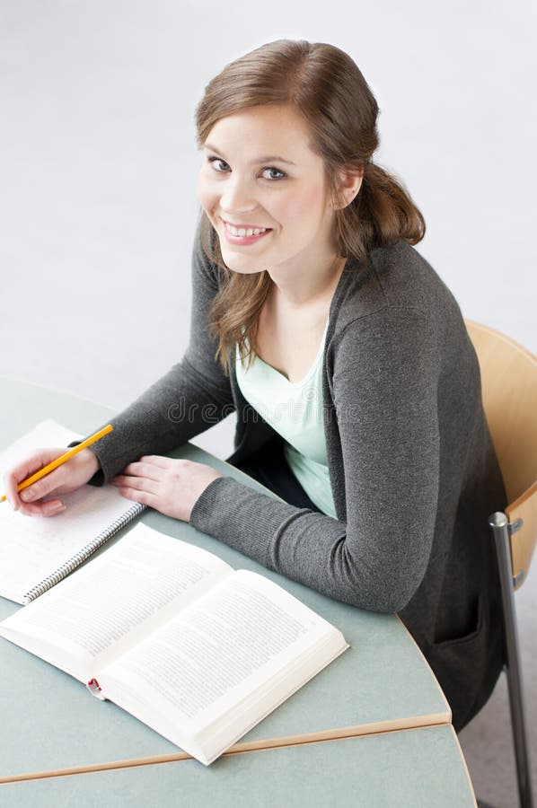 Woman studying in library stock photo. Image of knowledge - 13668042