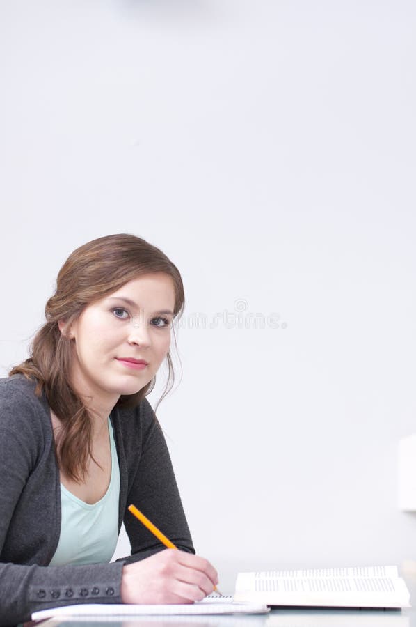 Female student studying stock photo. Image of brunette - 24600946