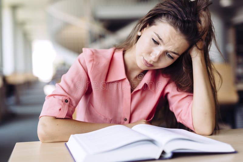 Female Student Studying in Library Stock Photo - Image of desk, exam ...