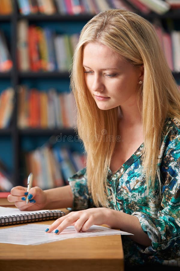 Female Student Studying in Library Stock Photo - Image of library, girl ...