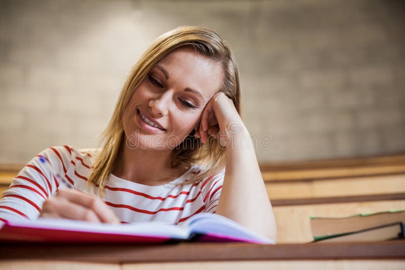 Female Student Taking Notes in a Class Stock Photo - Image of female ...