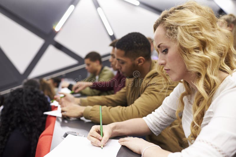 Female Student Taking Notes in a University Lecture Theatre Stock Image ...