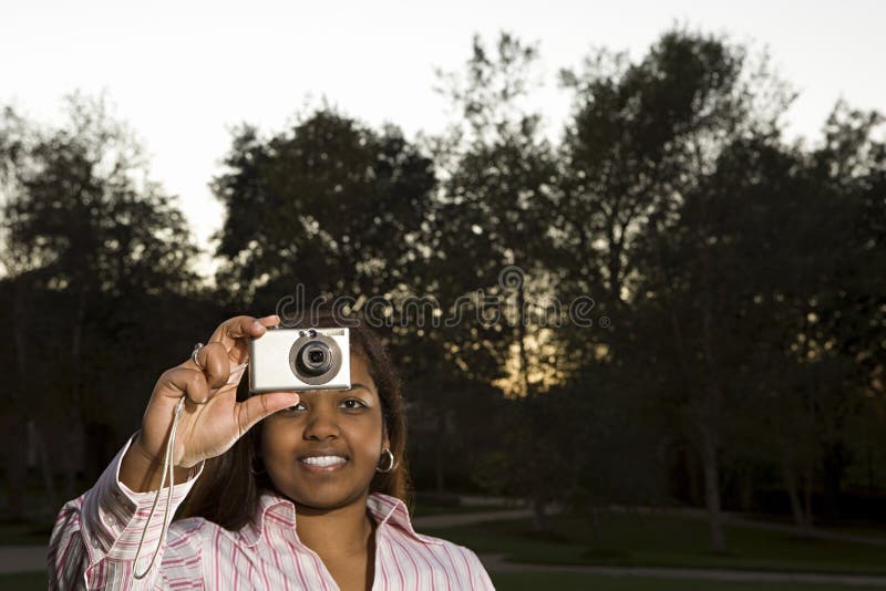 Female Student Taking a Photograph Outdoors Stock Photo - Image of ...