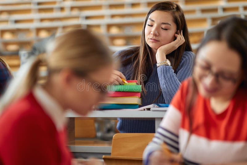 Female Student Taking a Rest at the Lecture Stock Image - Image of ...
