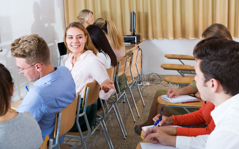 Female Student Talking with Groupmates during Classes Stock Image ...