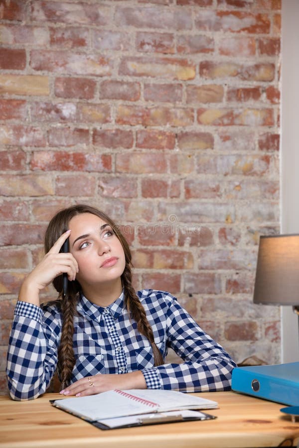 Female Student Thinking about Her Homework Stock Image - Image of ...