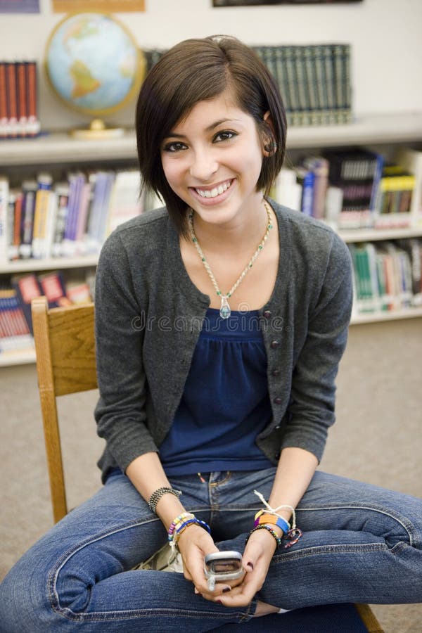 Female Student Using Cell Phone in Library Stock Photo - Image of ...