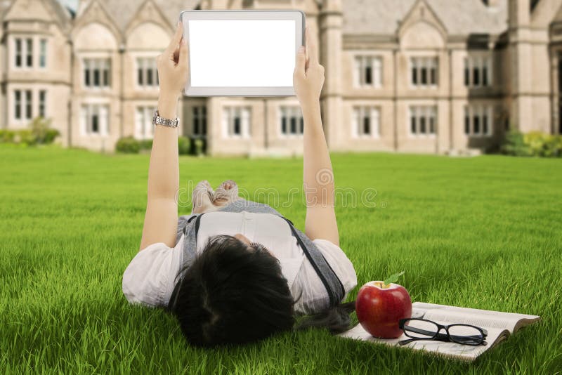 Female Student Using a Digital Tablet Outdoor Stock Photo - Image of ...