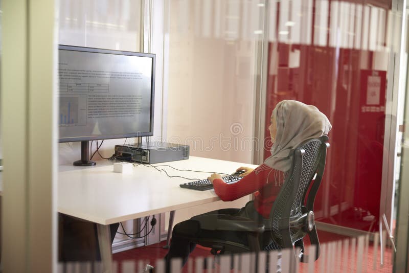 Female Student Working in Classroom with Large Screen Stock Photo ...