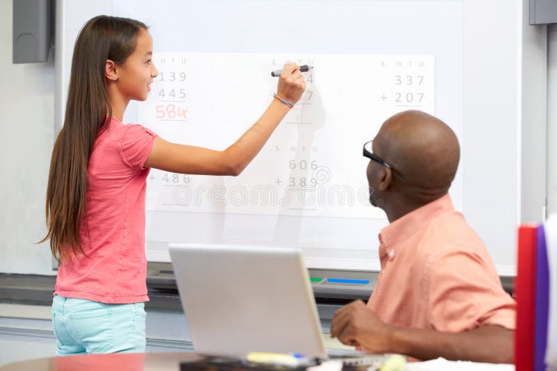 Female Student Writing Answer on Whiteboard Stock Image - Image of ...