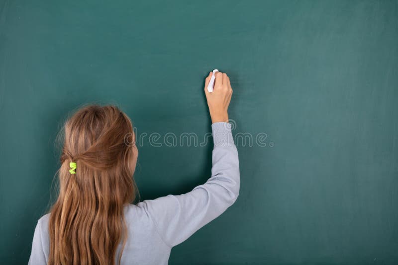 Female Student Writing with Chalk on Chalkboard Stock Photo - Image of ...