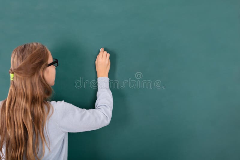 Female Student Writing with Chalk on Chalkboard Stock Image - Image of ...
