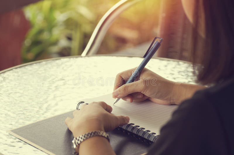 Female Student Writing in Notebook Stock Image - Image of girl ...