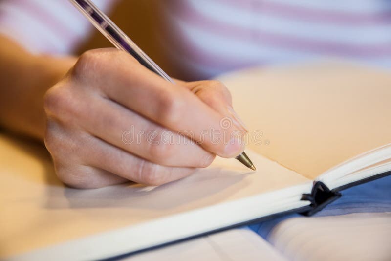 Female Student Writing Notes Stock Photo - Image of adult, homework ...
