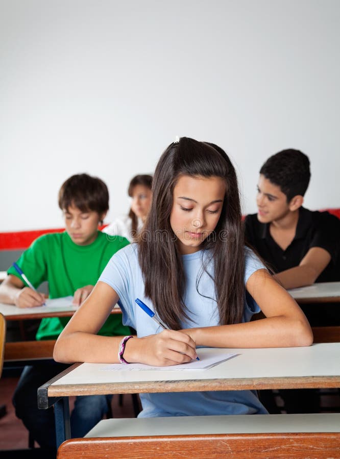 Male Teacher Assisting Students in Computer Class Stock Image - Image ...