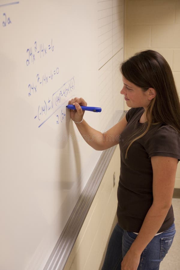 A Female Student Opens a Locker. Stock Photo - Image of people ...