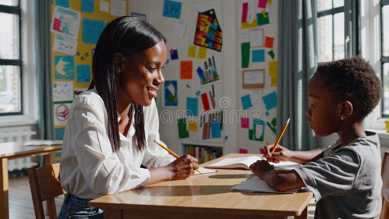 Female Students Collaborating on Homework in Bright Classroom Setting ...