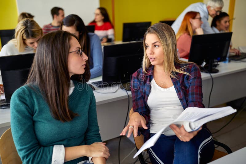 Female Students Discussing the Lesson at the Informatics Lecture Stock ...