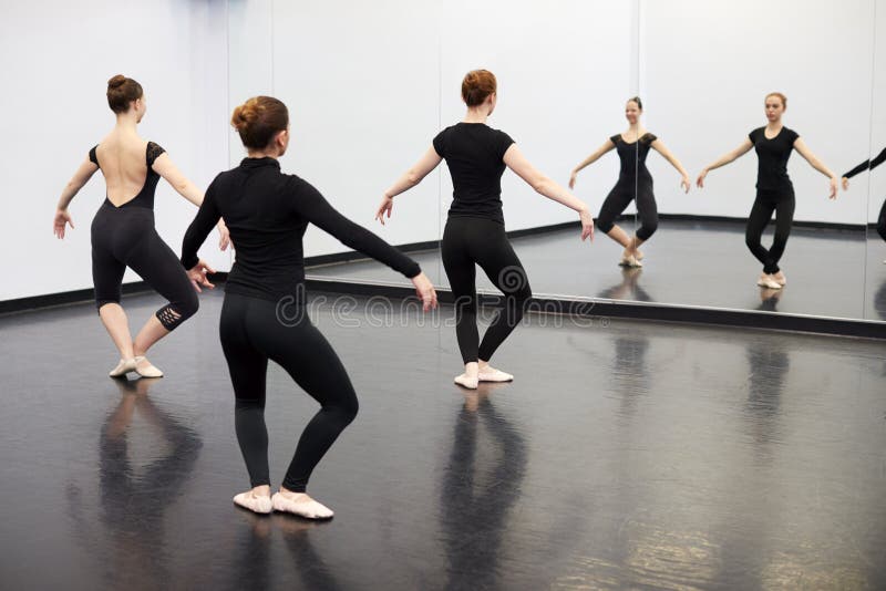 Female Students at Performing Arts School Rehearsing Ballet in Dance ...