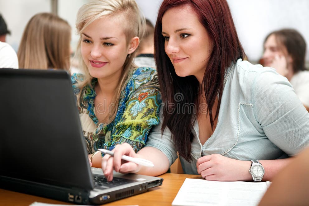 Female Students Using a Laptop Stock Photo - Image of intelligence ...