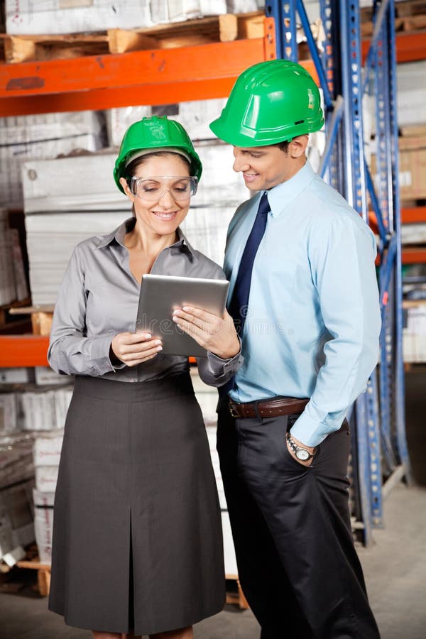 Female Supervisor and Colleague Using Digital Stock Photo - Image of ...