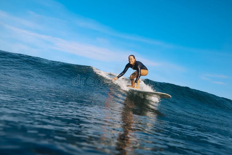 Female surfer on a wave stock photo. Image of nature - 176111094