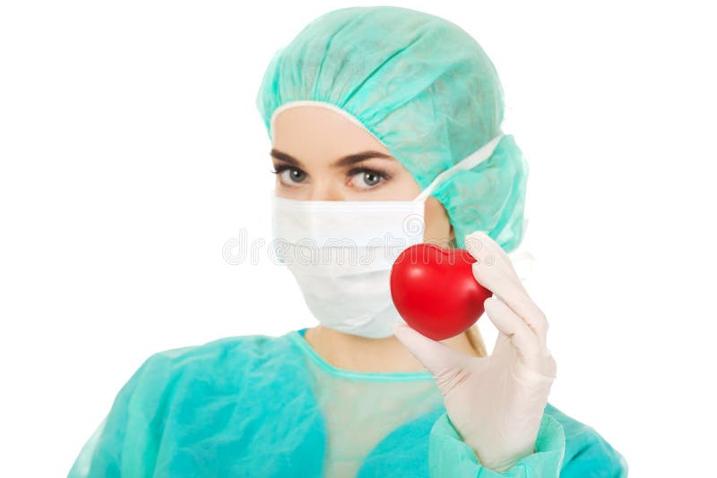Female Surgeon Doctor Holding Heart Stock Photo - Image of clinic ...