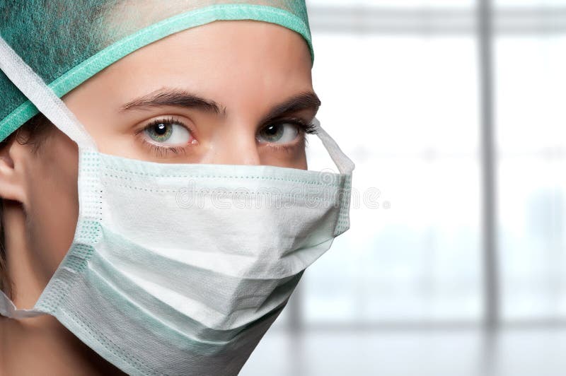 Female Surgeon with Face Mask Stock Image - Image of concentration ...
