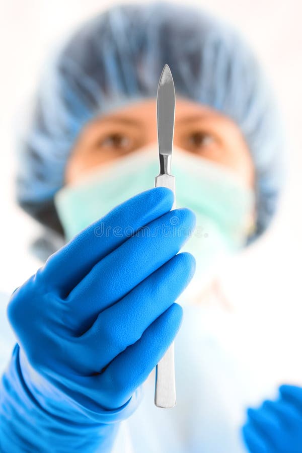 Female Surgeon With Scalpel Stock Photo - Image of operating, care ...