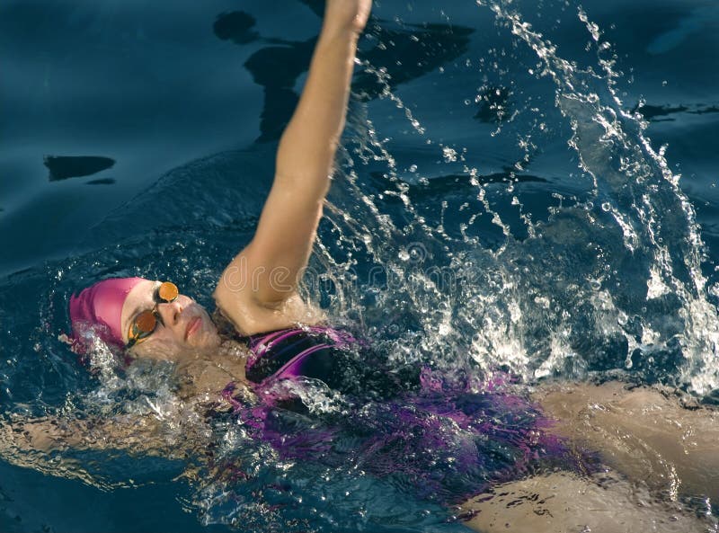 Female Swimmer back stroke stock image. Image of swim - 5940653