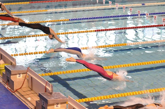 Female Swimmers Starting Blocks Stock Photos - Free & Royalty-Free ...