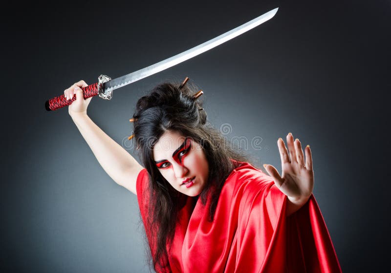 Warrior woman with sword stock image. Image of facial - 19036769