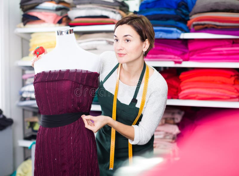 Tailor working at dress stock photo. Image of woman - 249177136