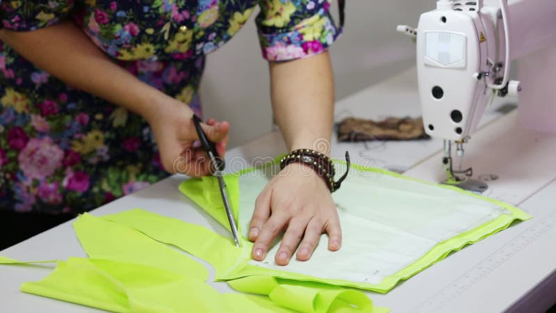 Female Tailor Hands Cutting Light Green Cloth on Stock Footage - Video ...