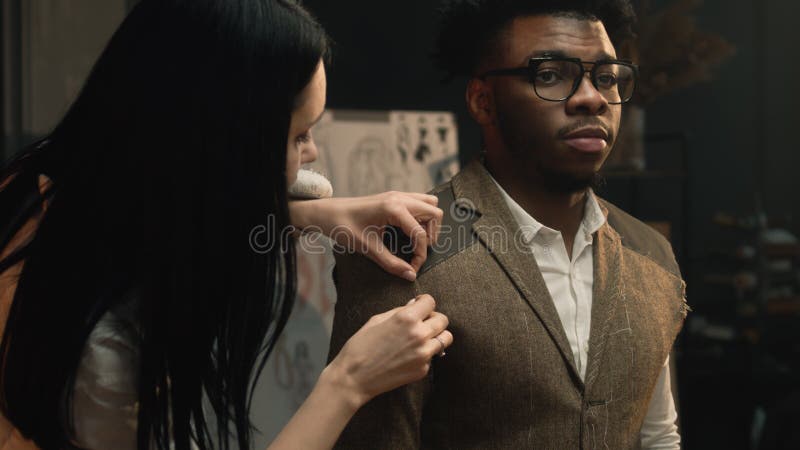 Female Tailor Measures Tailored Suit on Client Stock Photo - Image of ... Female Tailor Measures Tailored Suit on Client Stock Photo - Image of ...