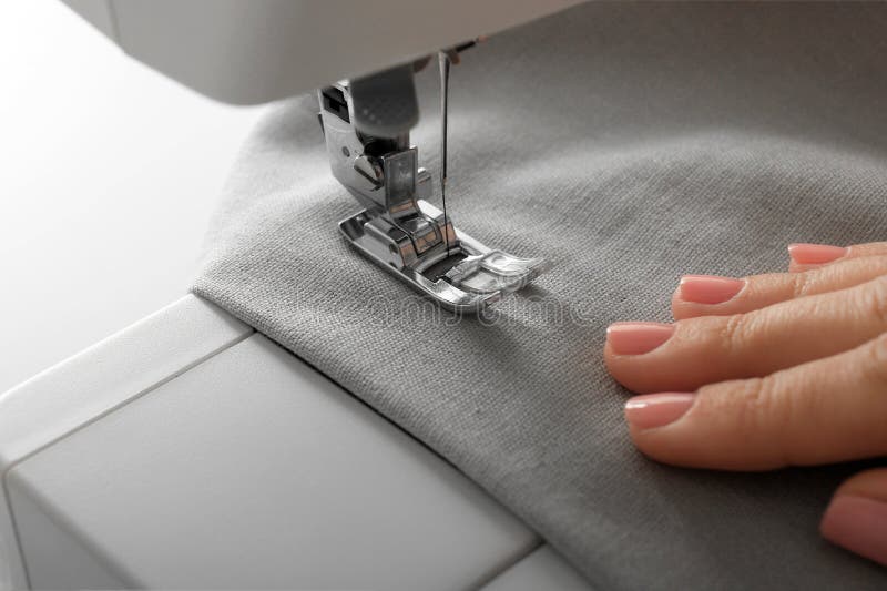 Female Tailor Using Sewing Machine, Closeup Stock Photo - Image of item ...