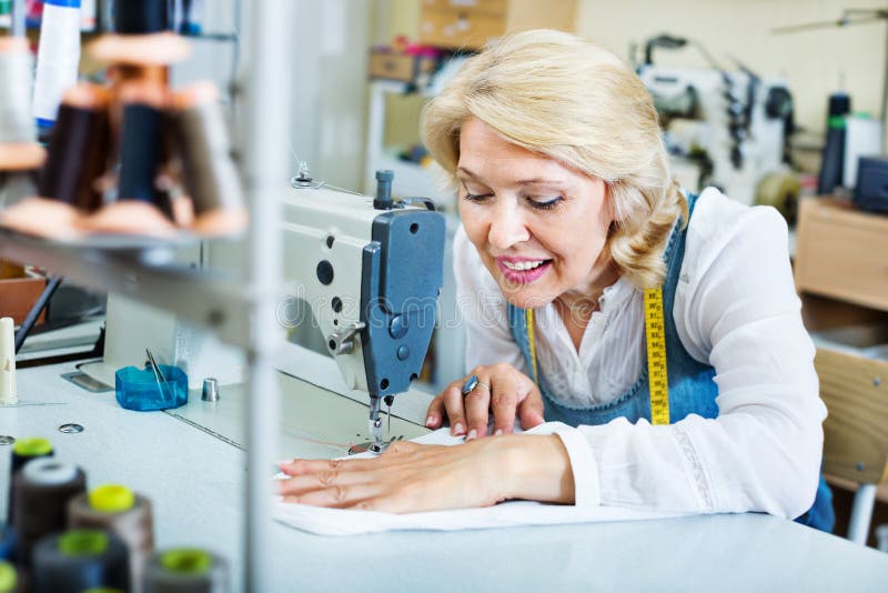 Tailor Working with Sewing Machine at Atelier Stock Image - Image of ...