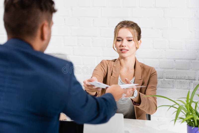 Female Taking Documents from Colleague, while Stock Image - Image of ...
