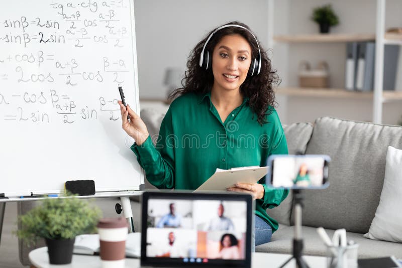 Female Teacher in Headset Explaining Math Online Making Videocall Stock ...