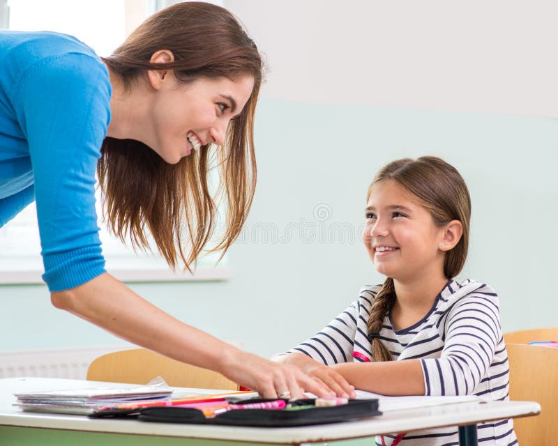 Female Teacher Shows the Children the Book, Reading Stock Image - Image ...