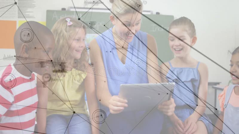 Female Teacher Tapping Tablet while Guiding Children Exploring ...