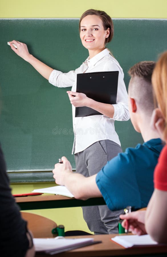 Female teacher during work stock photo. Image of learning - 41303384