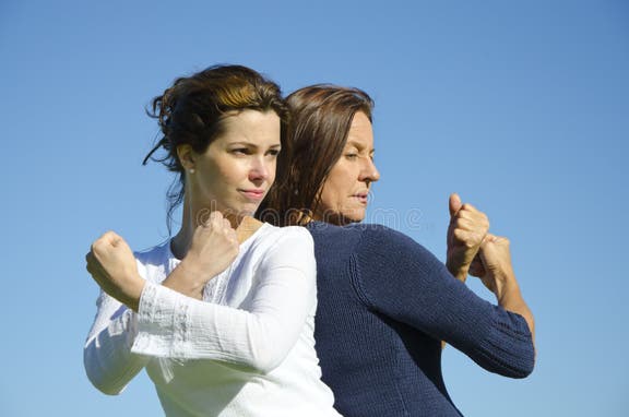 Two Generations Mother Daughter Fighting Stock Photos - Free & Royalty ...