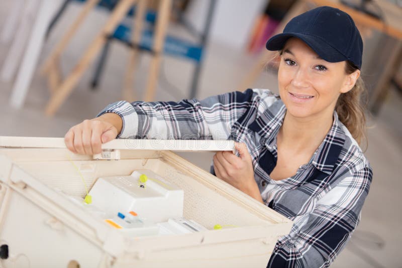 Female Tech Repairing Device at Workplace Stock Photo - Image of ...